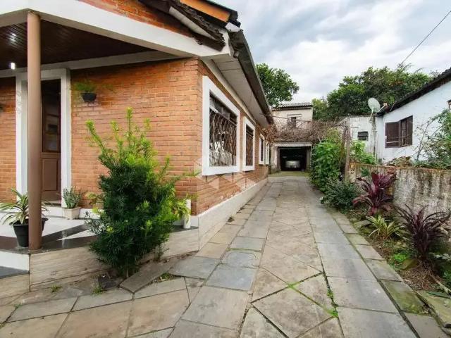 Casa / Sobrado para Venda em Canoas/RS Estância Velha 4 Quartos