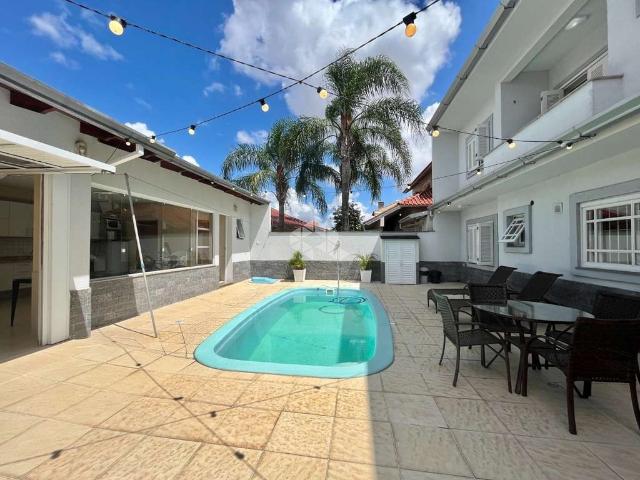 Casa / Sobrado para Venda em Canoas/RS Estância Velha 5 Quartos