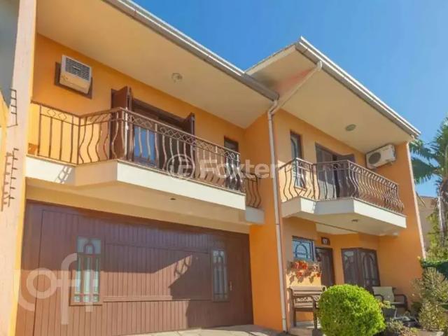 Casa / Sobrado para Venda em Canoas/RS Estância Velha 3 Quartos