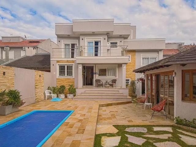 Casa / Sobrado para Venda em Canoas/RS Estância Velha 3 Quartos
