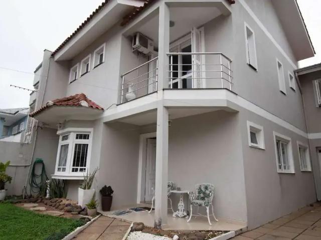 Casa / Sobrado para Venda em Canoas/RS Estância Velha 3 Quartos