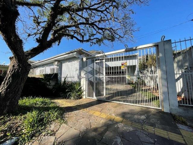 Casa / Sobrado para Venda em Canoas/RS Estância Velha 3 Quartos
