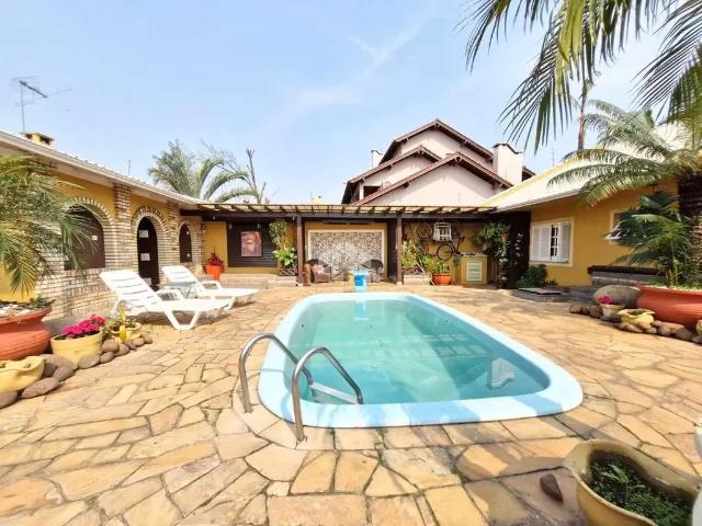 Casa / Sobrado para Venda em Canoas/RS Estância Velha 3 Quartos