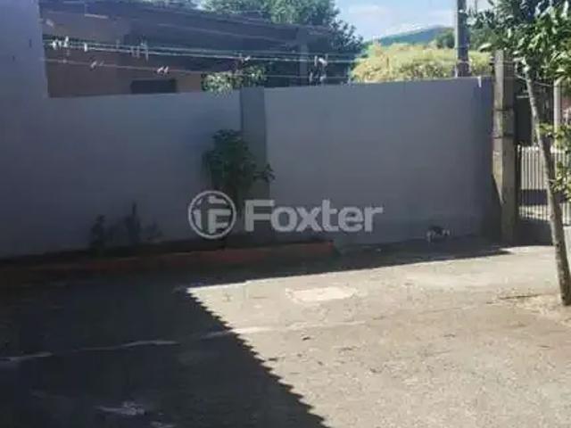 Casa / Sobrado para Venda em Canoas/RS Guajuviras 4 Quartos