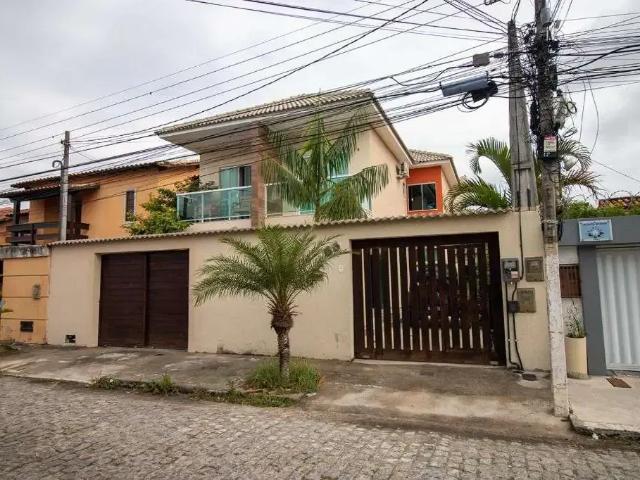 Casa / Sobrado para Venda em Cabo Frio/RJ Jardim Flamboyant 4 Quartos