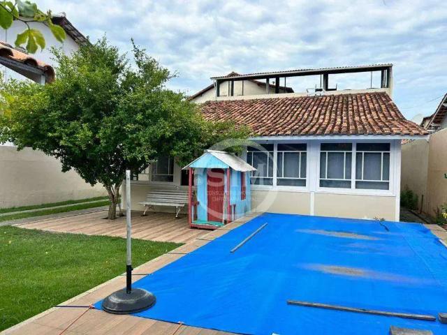 Casa / Sobrado para Venda em Cabo Frio/RJ Jardim Flamboyant 4 Quartos