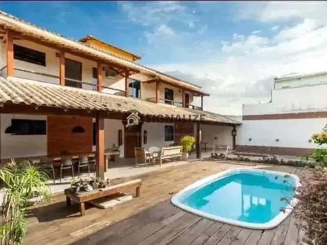 Casa / Sobrado para Venda em Cabo Frio/RJ Peró 4 Quartos
