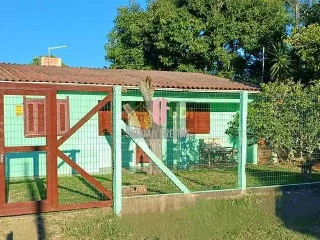 Casa / Sobrado para Venda em Capão da Canoa/RS Curumim 3 Quartos