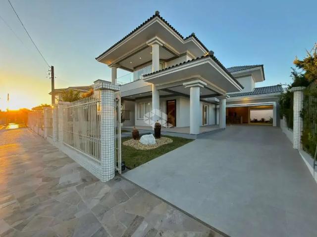Casa / Sobrado para Venda em Capão da Canoa/RS Girassol 3 Quartos