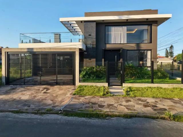 Casa / Sobrado para Venda em Capão da Canoa/RS Zona Nova 3 Quartos