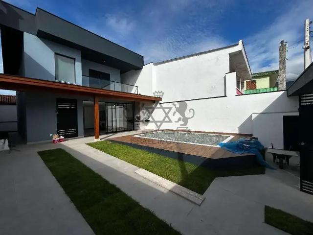 Casa / Sobrado para Venda em Caraguatatuba/SP Capricórnio I 4 Quartos