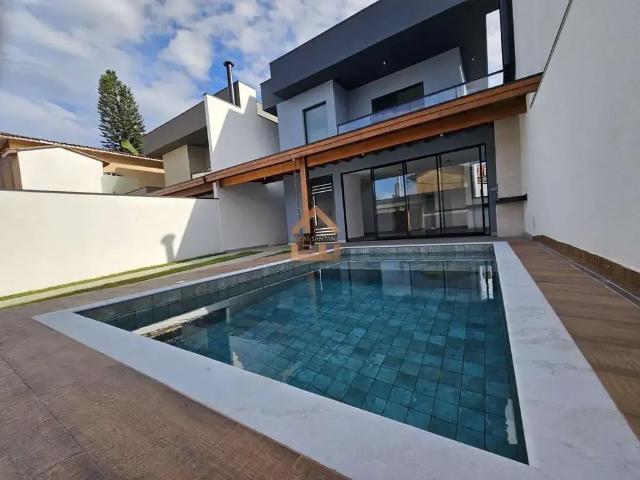 Casa / Sobrado para Venda em Caraguatatuba/SP Capricórnio I 4 Quartos
