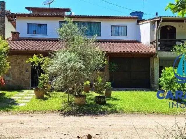 Casa / Sobrado para Venda em Caraguatatuba/SP Capricórnio I 4 Quartos