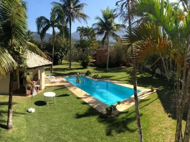 Casa / Sobrado para Venda em Caraguatatuba/SP Capricórnio I 4 Quartos