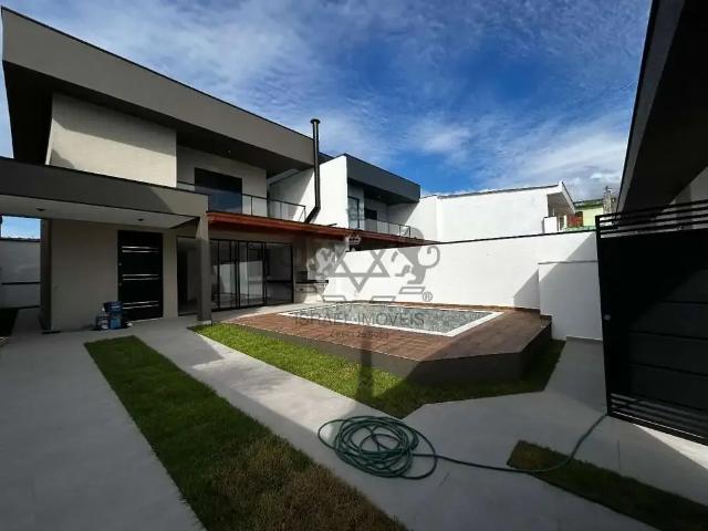 Casa / Sobrado para Venda em Caraguatatuba/SP Capricórnio I 4 Quartos