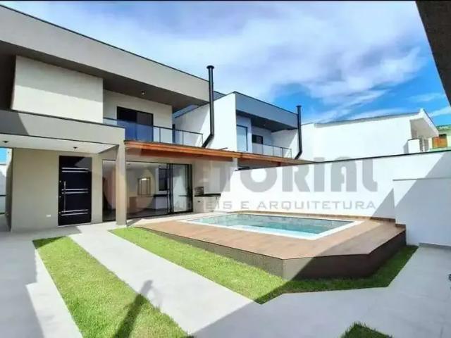 Casa / Sobrado para Venda em Caraguatatuba/SP Capricórnio I 4 Quartos