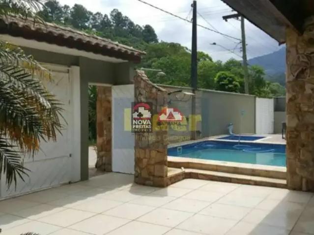 Casa / Sobrado para Venda em Caraguatatuba/SP Capricórnio III 4 Quartos