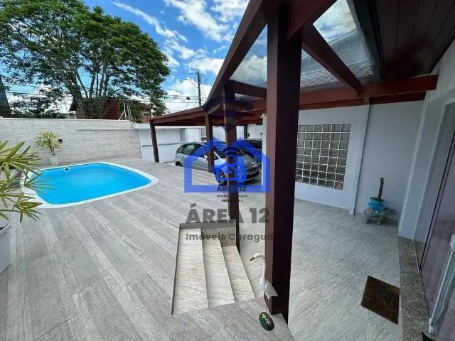 Casa / Sobrado para Venda em Caraguatatuba/SP Indaiá 4 Quartos