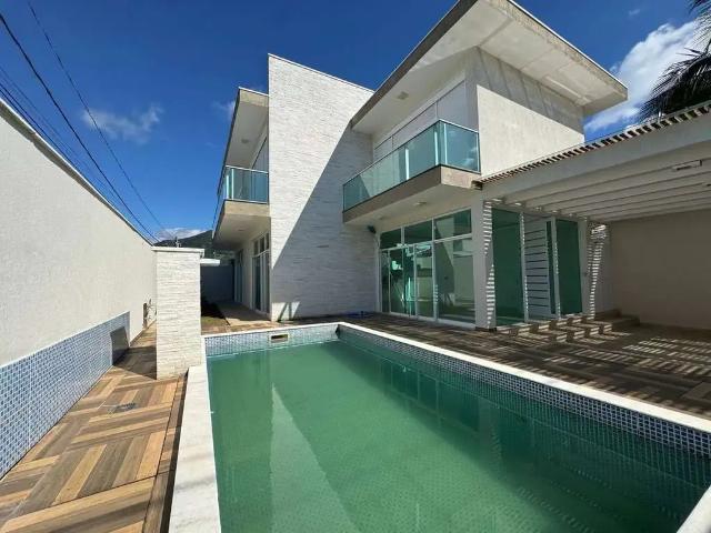 Casa / Sobrado para Venda em Caraguatatuba/SP Indaiá 4 Quartos