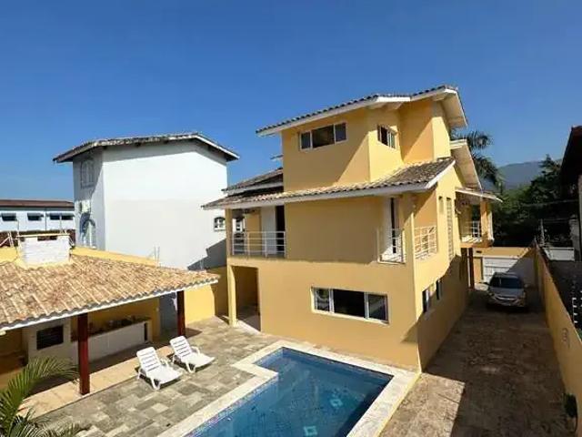 Casa / Sobrado para Venda em Caraguatatuba/SP Jardim Primavera 4 Quartos
