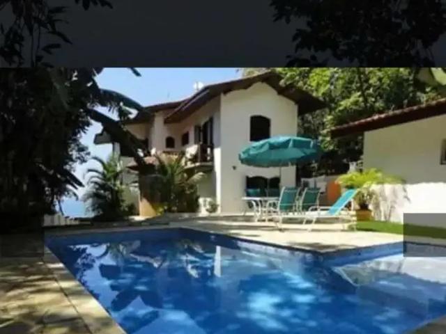 Casa / Sobrado para Venda em Caraguatatuba/SP Loteamento Roteiro do Sol 4 Quartos