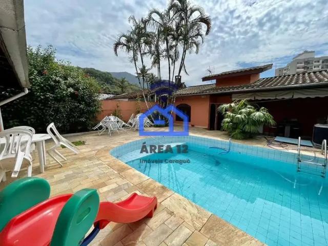 Casa / Sobrado para Venda em Caraguatatuba/SP Martim de Sá 4 Quartos