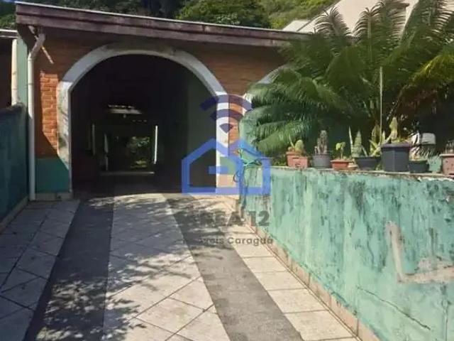 Casa / Sobrado para Venda em Caraguatatuba/SP Martim de Sá 4 Quartos