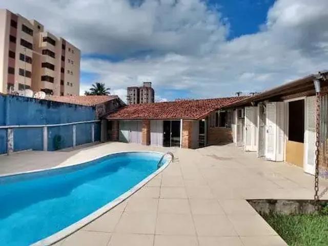 Casa / Sobrado para Venda em Caraguatatuba/SP Martim de Sá 4 Quartos
