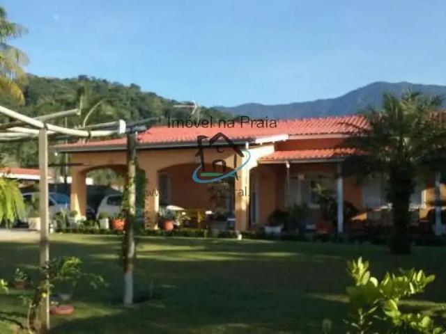 Casa / Sobrado para Venda em Caraguatatuba/SP Massaguaçu 4 Quartos