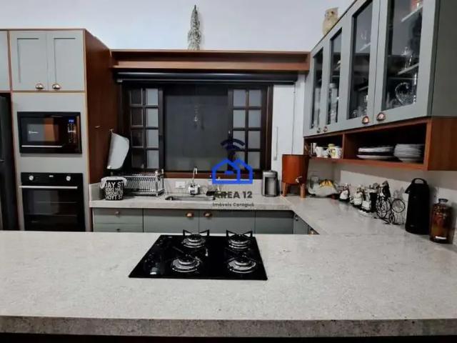 Casa / Sobrado para Venda em Caraguatatuba/SP Massaguaçu 4 Quartos