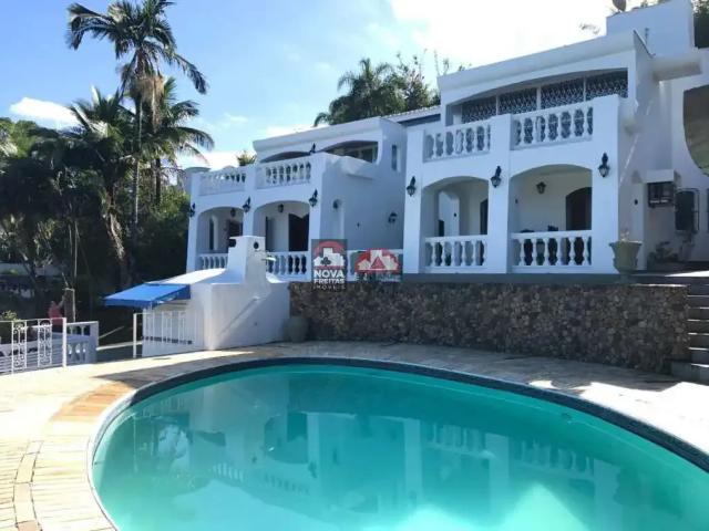Casa / Sobrado para Venda em Caraguatatuba/SP Massaguaçu 4 Quartos