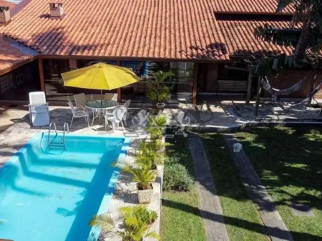 Casa / Sobrado para Venda em Caraguatatuba/SP Praia das Palmeiras 4 Quartos