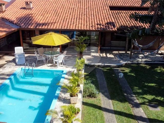 Casa / Sobrado para Venda em Caraguatatuba/SP Praia das Palmeiras 4 Quartos