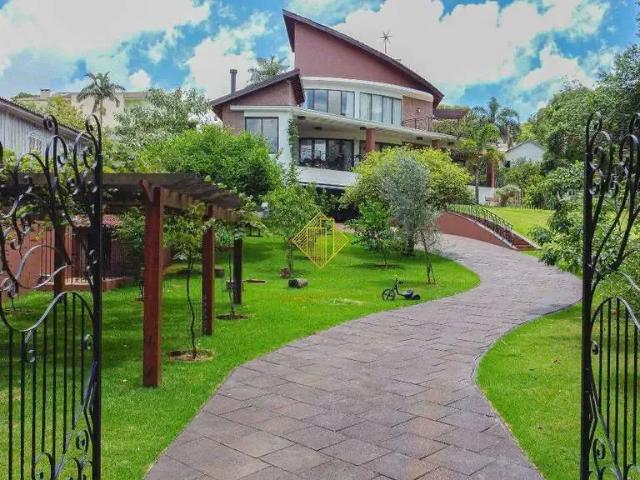 Casa / Sobrado para Venda em Cascavel/PR Região do Lago 4 Quartos