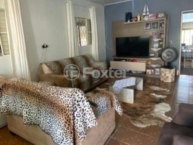 Casa / Sobrado para Venda em Esteio/RS Vila Três Marias 2 Quartos