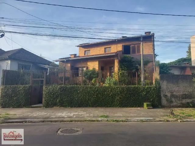 Casa / Sobrado para Venda em Esteio/RS Centro 4 Quartos