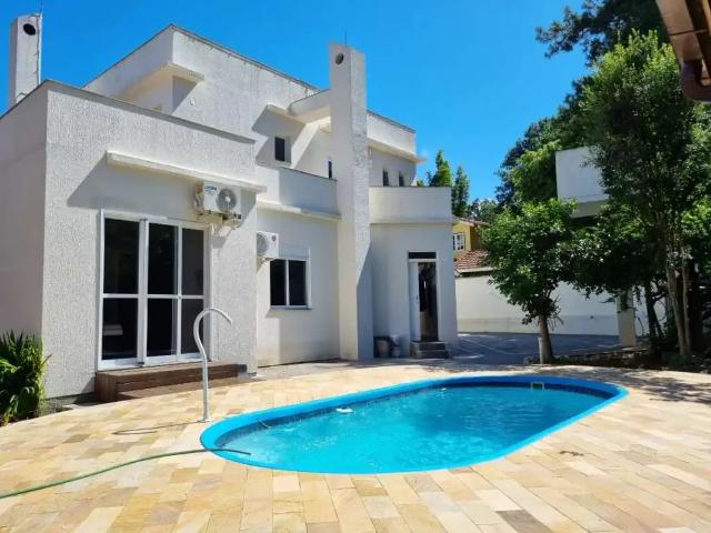 Casa / Sobrado para Venda em Florianópolis/SC Cacupé 4 Quartos