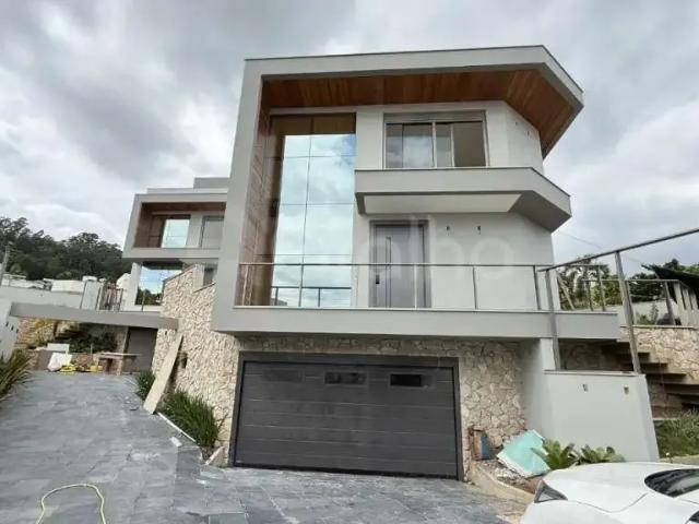 Casa / Sobrado para Venda em Florianópolis/SC Cacupé 4 Quartos