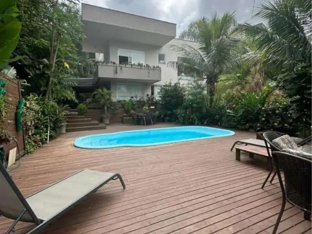Casa / Sobrado para Venda em Florianópolis/SC Cacupé 4 Quartos