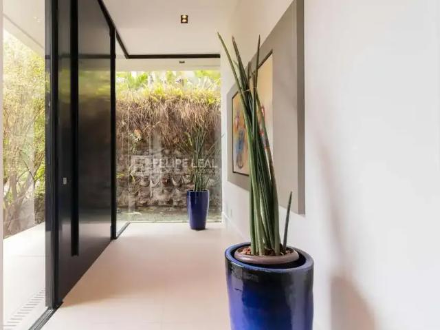 Casa / Sobrado para Venda em Florianópolis/SC Cacupé 5 Quartos
