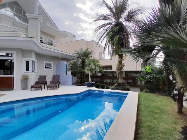 Casa / Sobrado para Venda em Florianópolis/SC Jurerê Internacional 5 Quartos