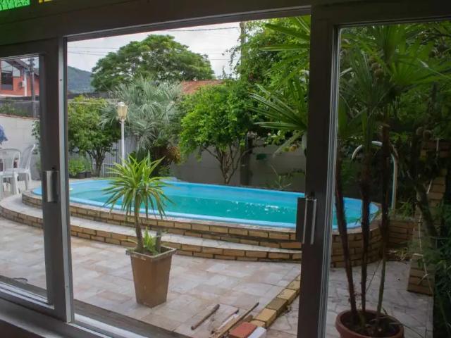 Casa / Sobrado para Venda em Florianópolis/SC Rio Tavares 5 Quartos