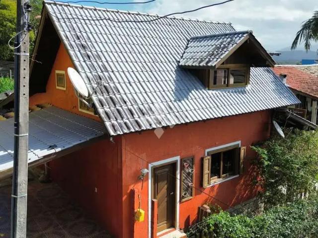 Casa / Sobrado para Venda em Garopaba/SC Praia da Ferrugem 3 Quartos