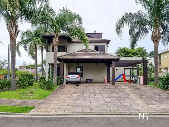 Casa / Sobrado para Venda em Gravataí/RS Alphaville 4 Quartos