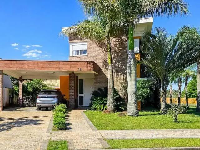 Casa / Sobrado para Venda em Gravataí/RS Alphaville 4 Quartos