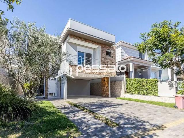 Casa / Sobrado para Venda em Gravataí/RS Alphaville 4 Quartos