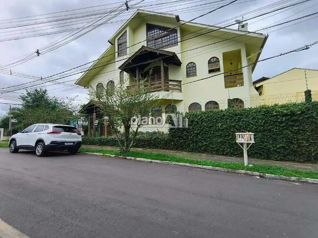 Casa / Sobrado para Venda em Gravataí/RS Centro 4 Quartos