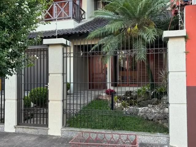 Casa / Sobrado para Venda em Gravataí/RS Dom Feliciano 4 Quartos