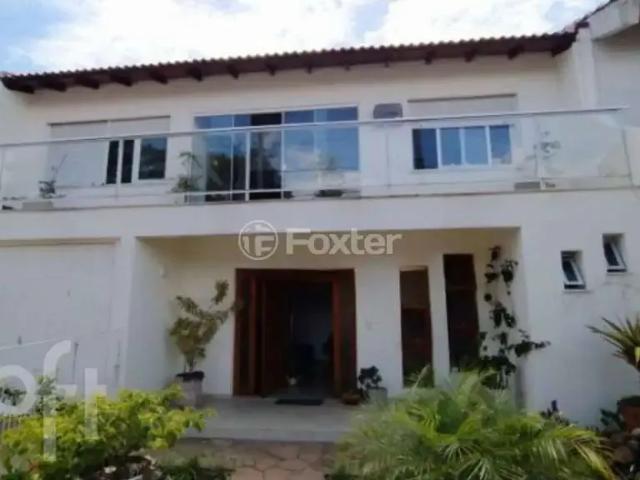 Casa / Sobrado para Venda em Gravataí/RS Dom Feliciano 4 Quartos