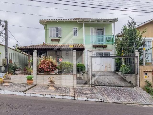 Casa / Sobrado para Venda em Gravataí/RS Loteamento Jardim Timbaúva 3 Quartos